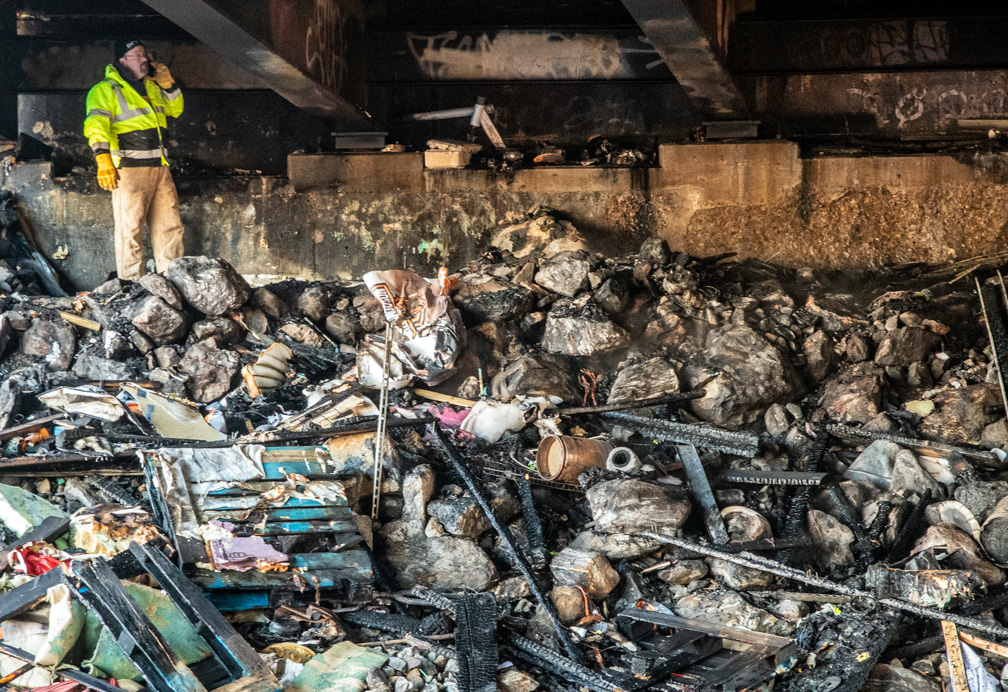 Heavy smoke rising from highway underpass traced to fire at homeless ...